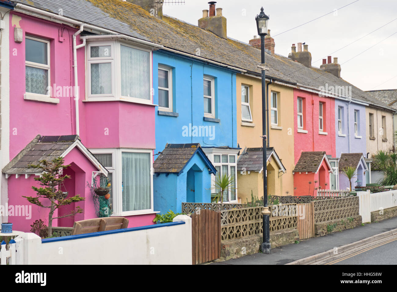 A section of colorful terraced housing in a west country seaside town ...