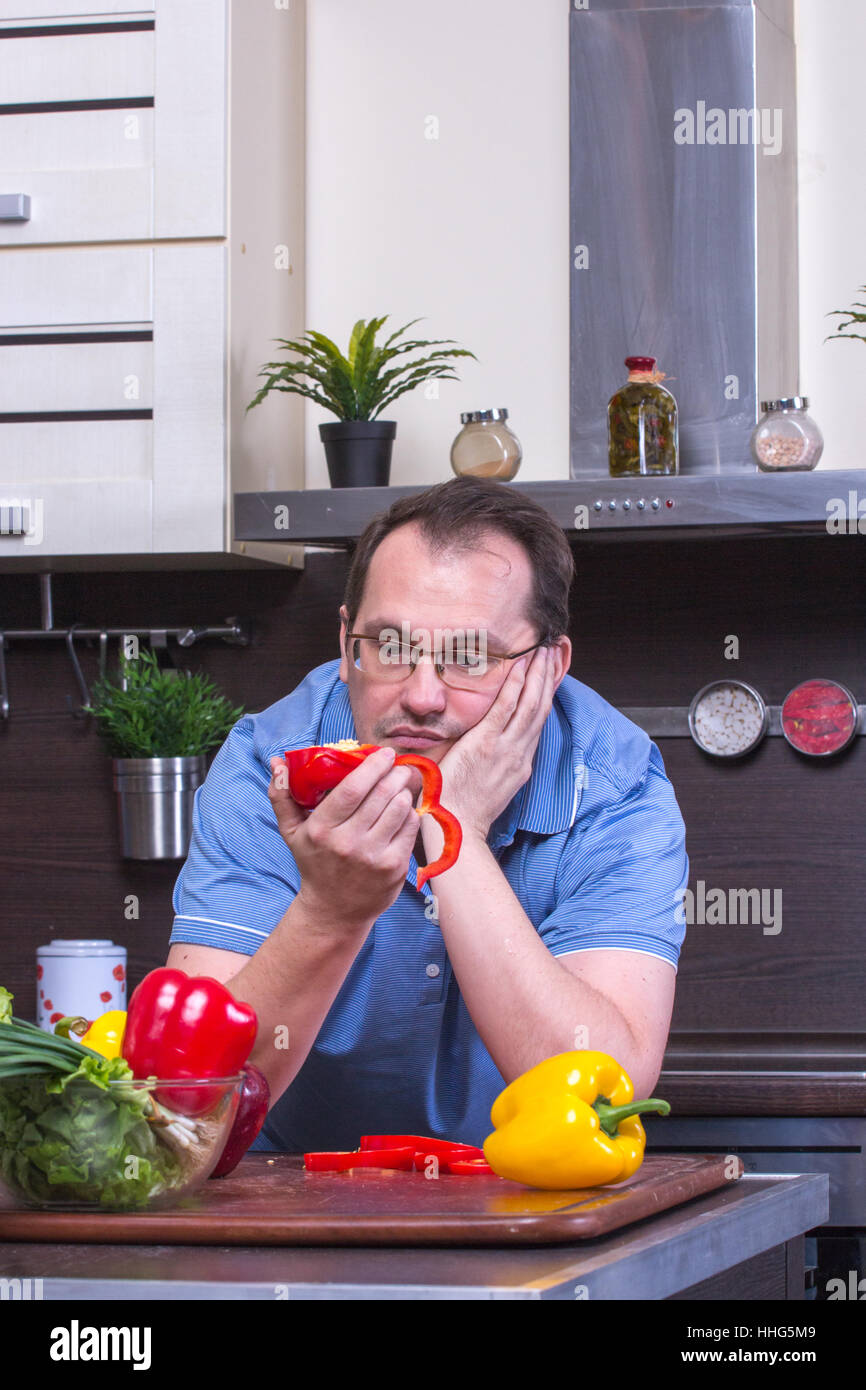 Portrait adult sad man cooking hi-res stock photography and images - Alamy