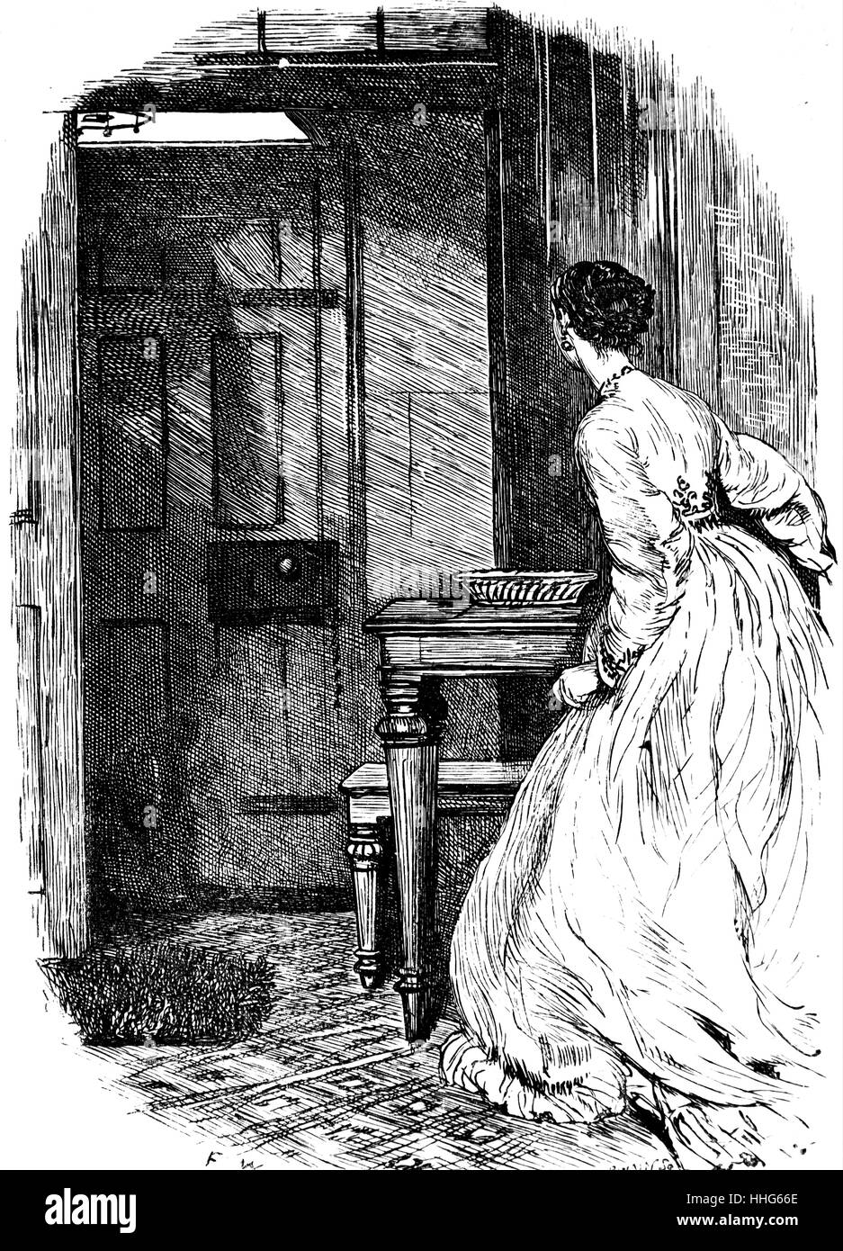 Woman answer door Black and White Stock Photos & Images - Alamy