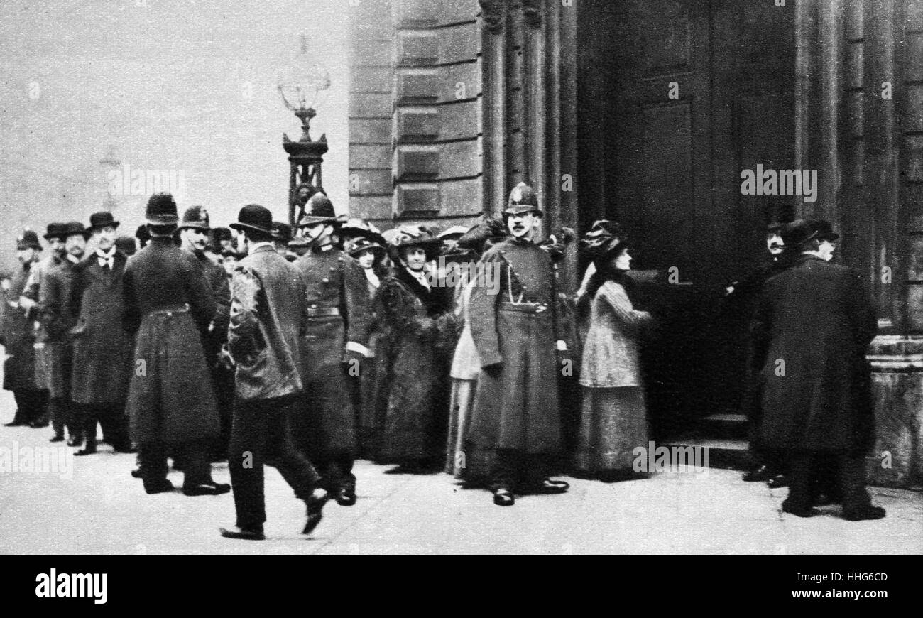 Suffragettes waiting outside Bow Street Police Station, London, to ...