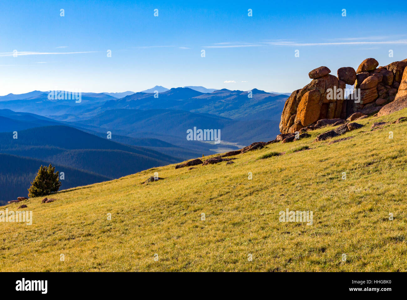 Rock formations along a ridge in a mountain forest landscape scene in ...