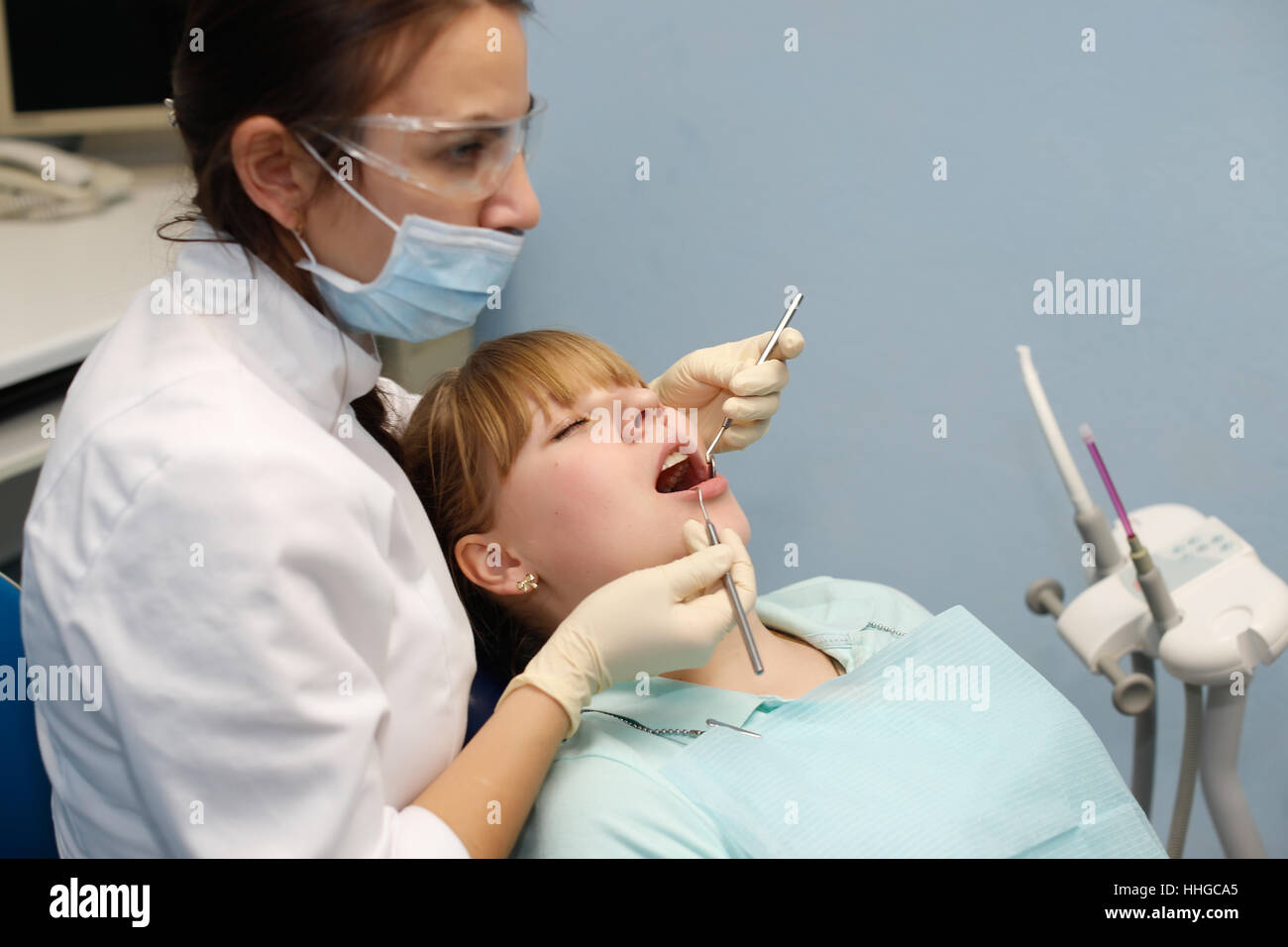 Patient at a reception the dentist Stock Photo - Alamy