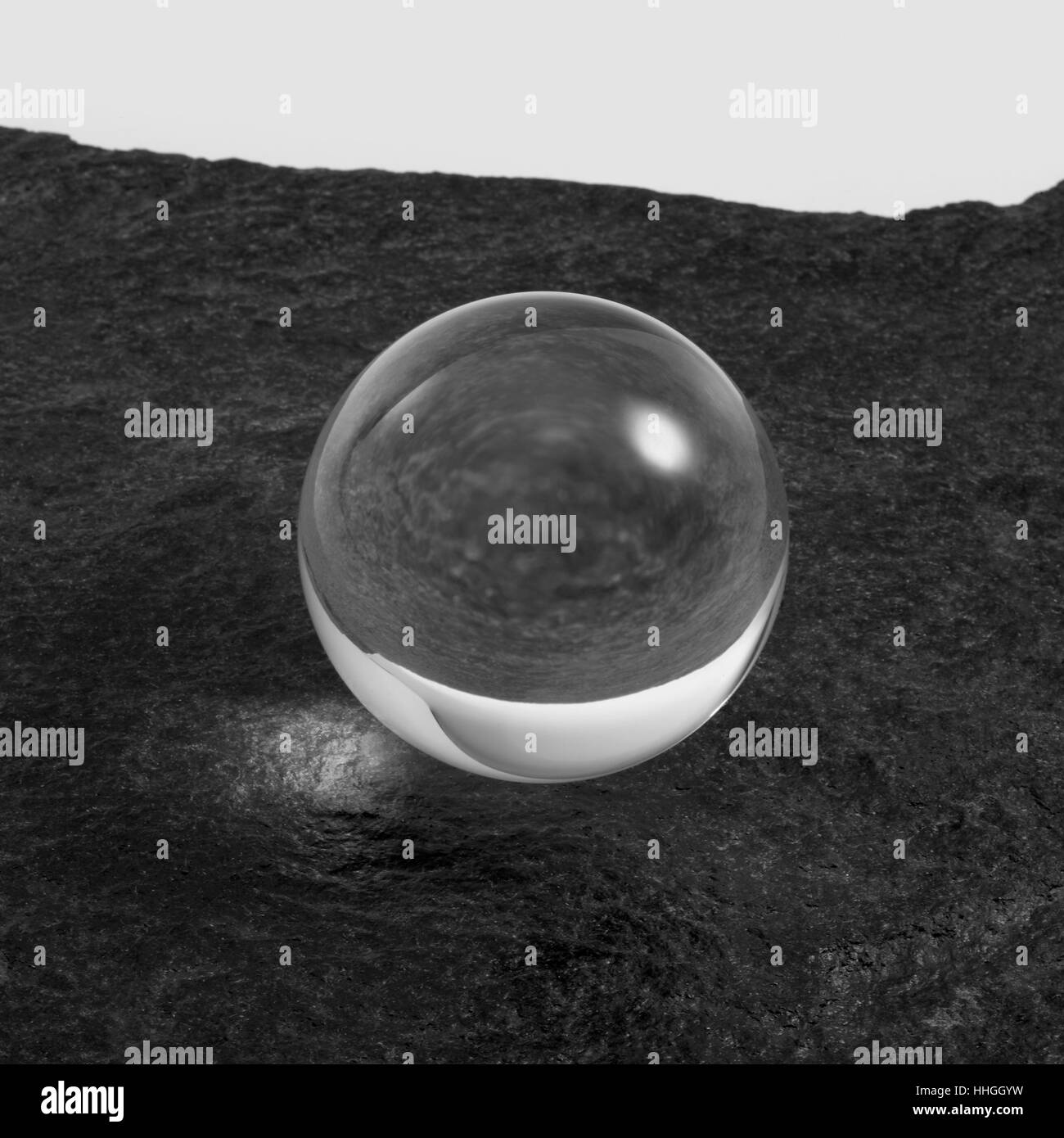 crystal ball on stone surface Stock Photo - Alamy