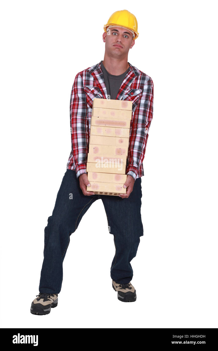 Mason carrying bricks hi-res stock photography and images - Alamy