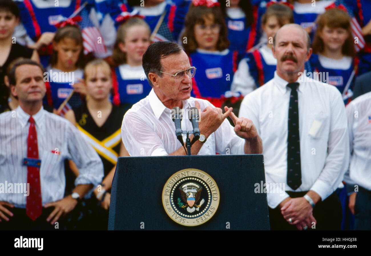 A rain-soaked President George H.W. Bush campaigns for a second four ...