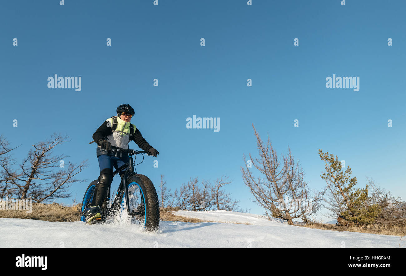 Fatbike also called fat bike or fat-tire bike - Cycling on large tire ...