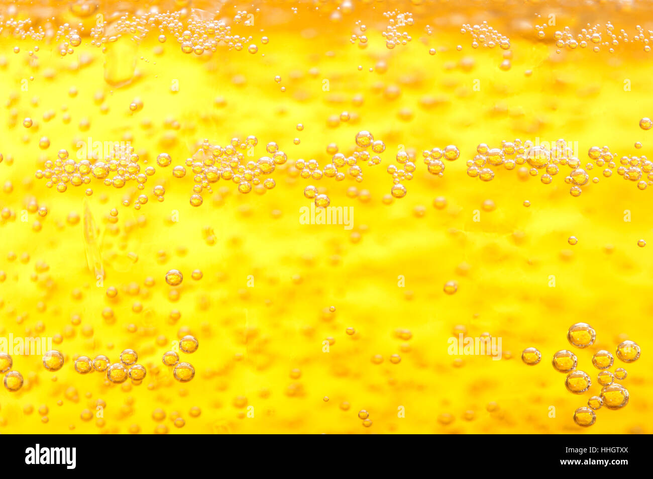 thousands of small bubbles in beer Stock Photo - Alamy