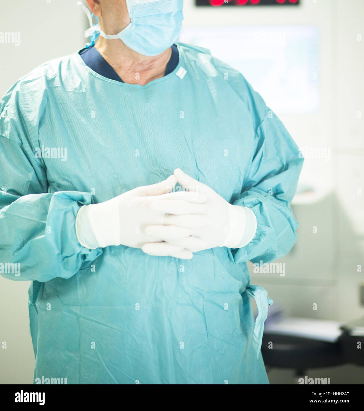 Surgeon in hospital surgery in sterile uniform "scrubs" in operating ...