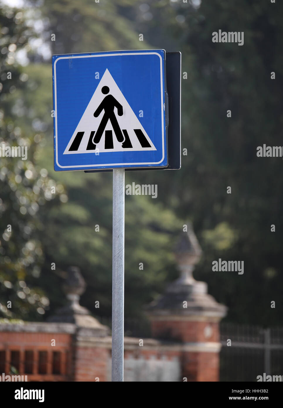 road sign warning pedestrian crossing in the city and the pedestrian ...