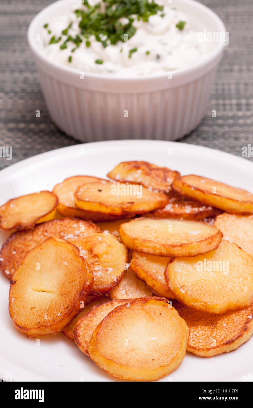 fried potatoes with cottage cheese Stock Photo - Alamy