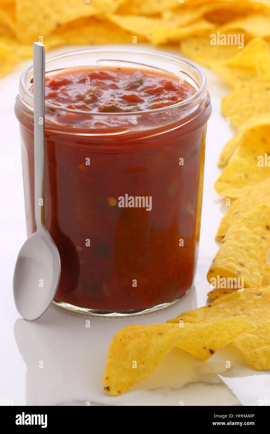 Artisan mexican dip salsa on vintage carrara marble table, with a ...