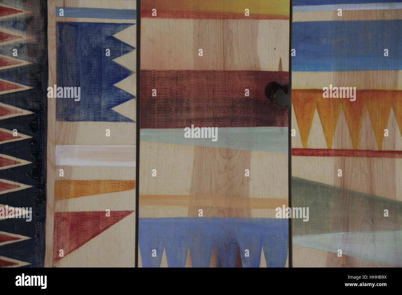 Photograph of a geometric pattern painted on wood Stock Photo - Alamy