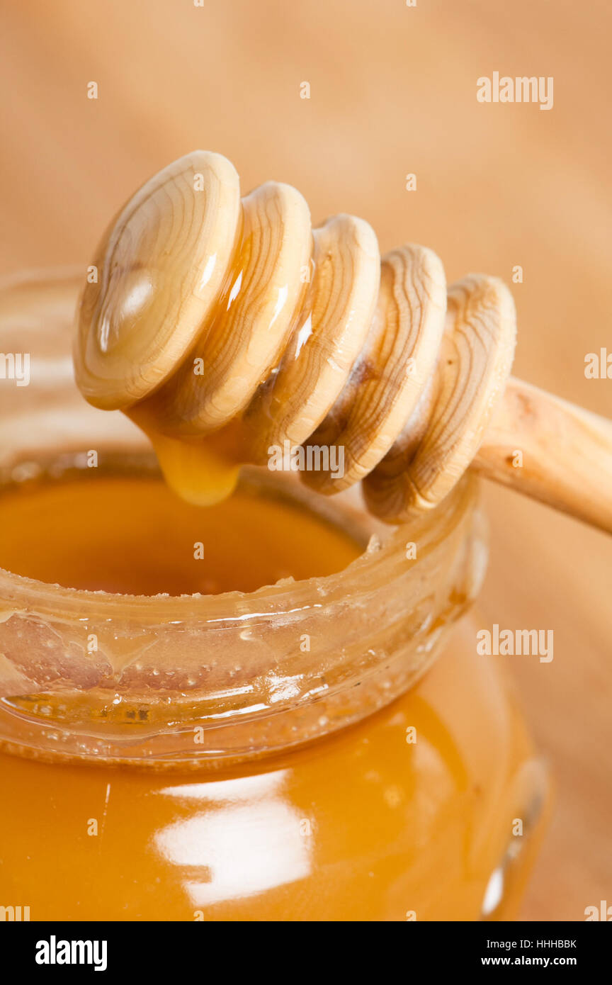 fresh gold honey dipper Stock Photo - Alamy