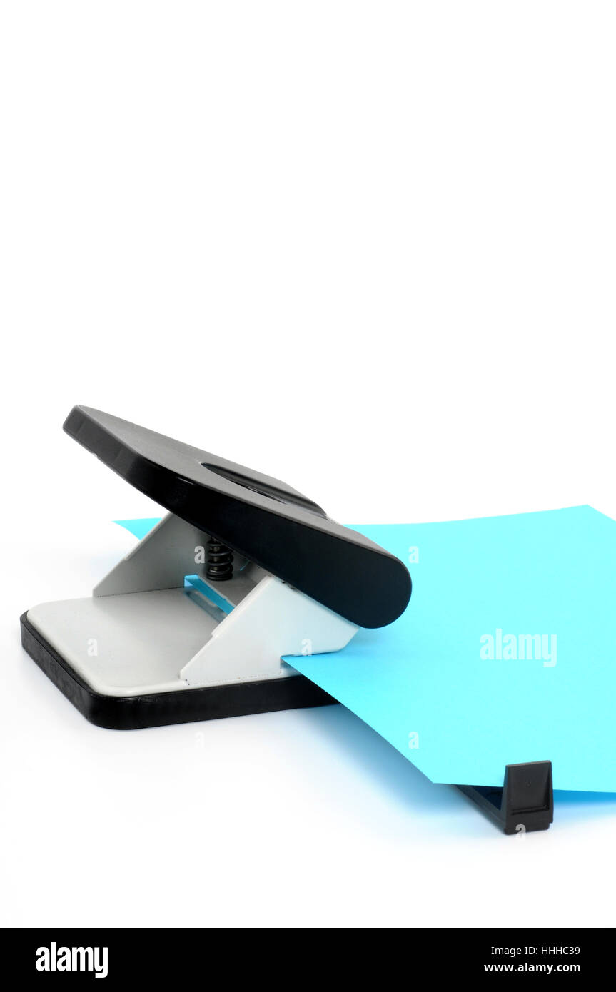 locher with colored paper in front of a white background Stock Photo ...