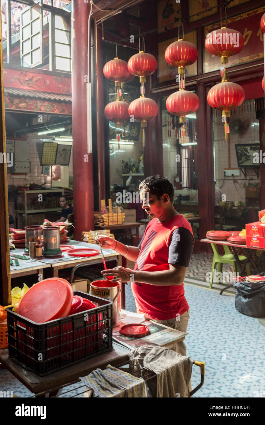 Temple workers in the Sin Sze Si Ya Temple in Kuala Lumpur, Malaysia ...