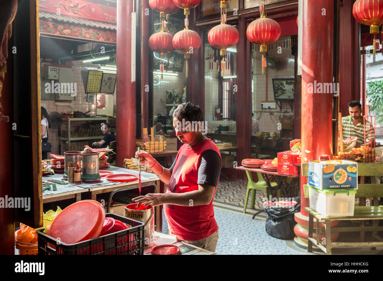 Temple workers in the Sin Sze Si Ya Temple in Kuala Lumpur, Malaysia ...