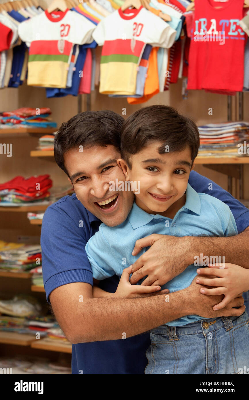 father and son in shop Stock Photo - Alamy