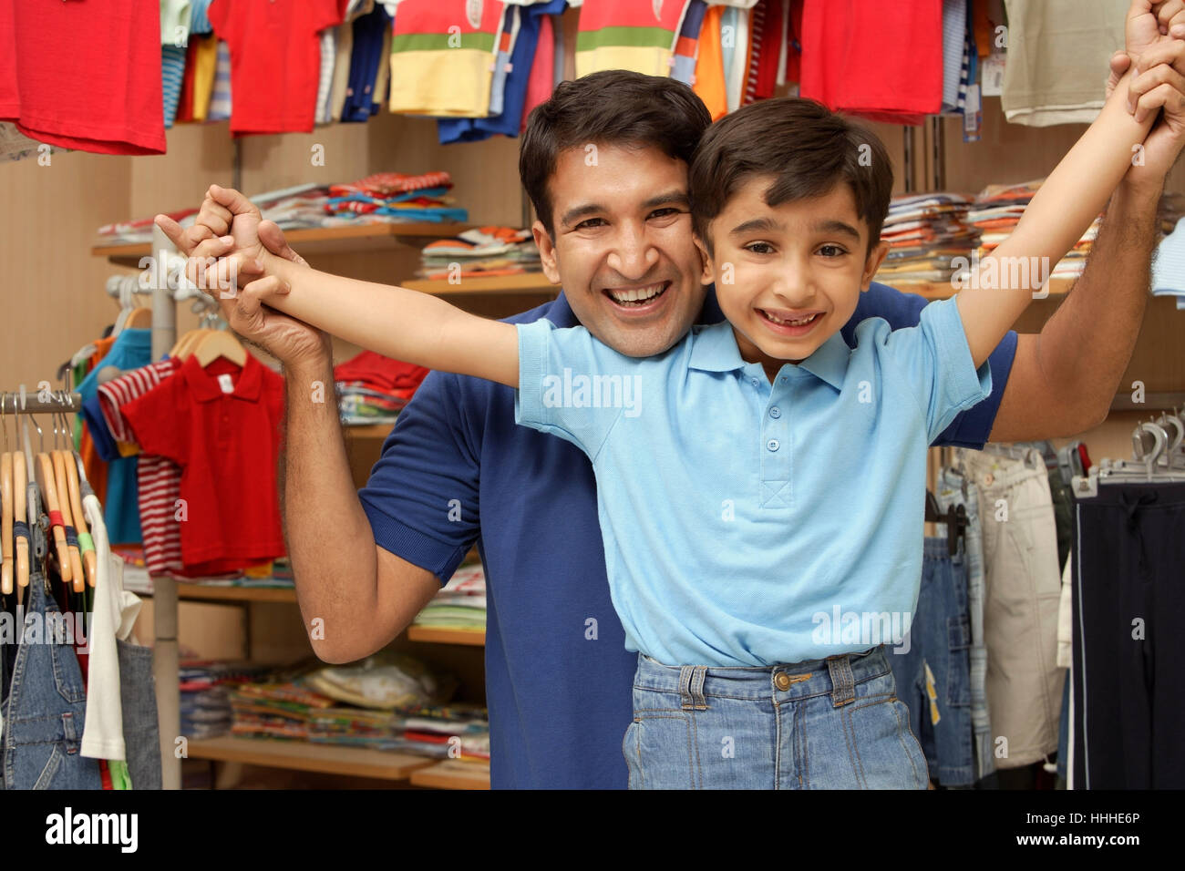 father and son in shop Stock Photo - Alamy