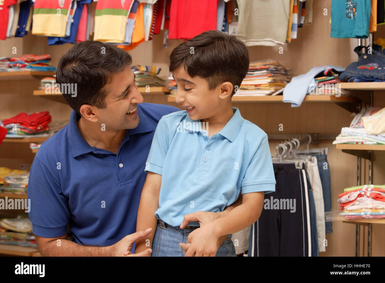 father and son in shop Stock Photo - Alamy