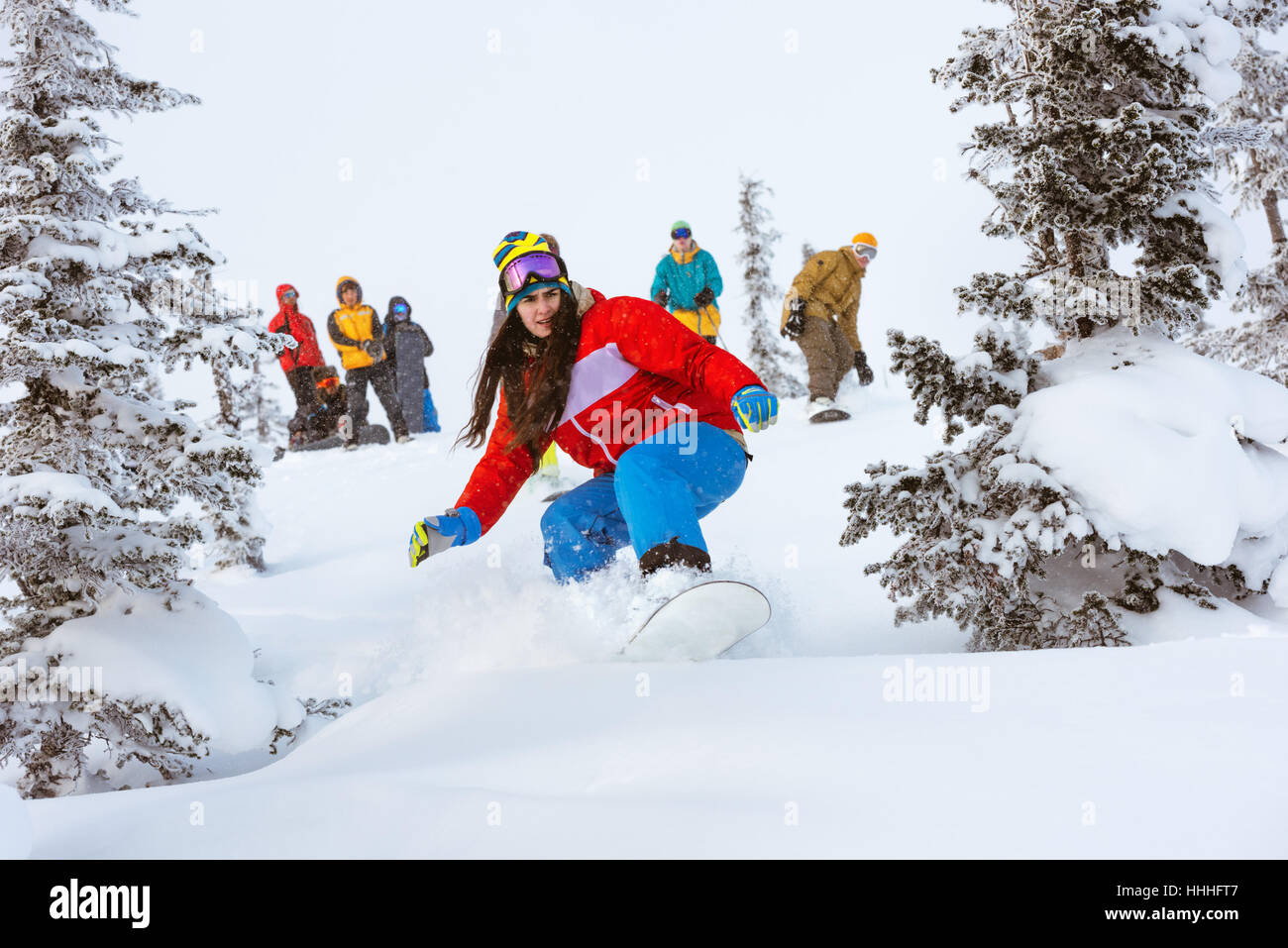 Girl snowboarder team group friends off-piste Stock Photo - Alamy