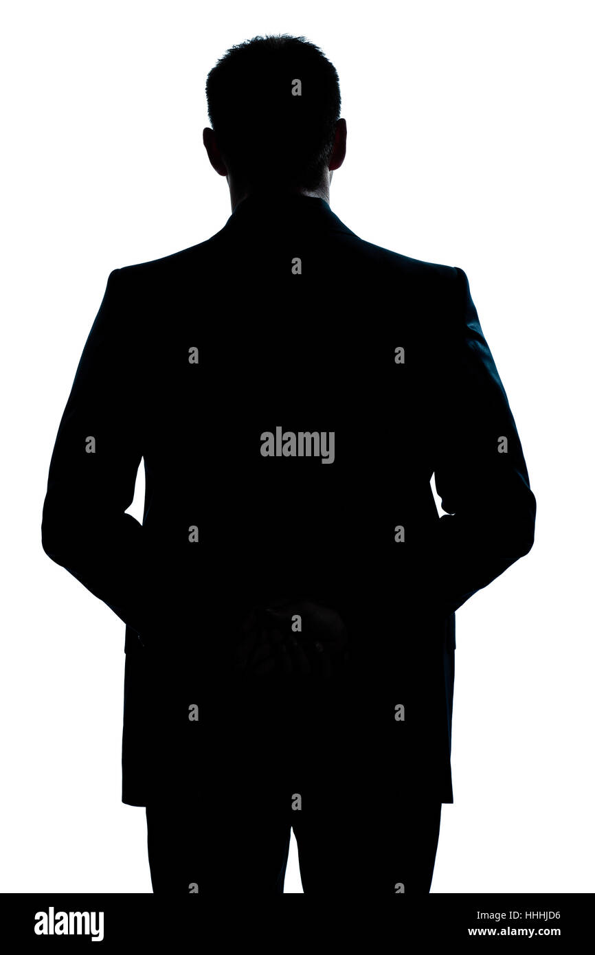one caucasian man portrait silhouette backside standing hands behind ...