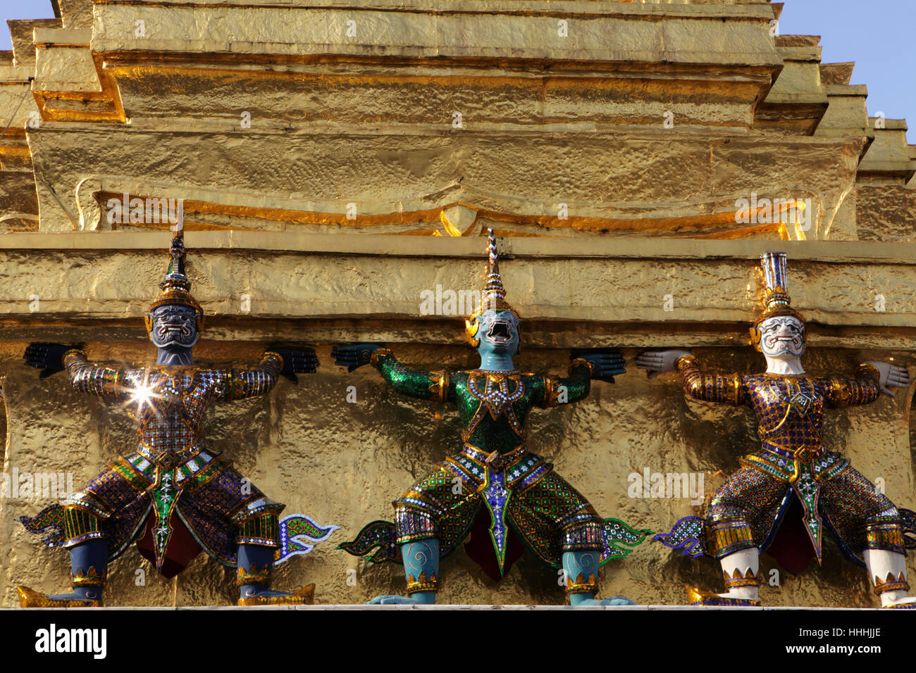 Gold statues on Wat at Grand Palace, Bangkok Thailand Stock Photo - Alamy