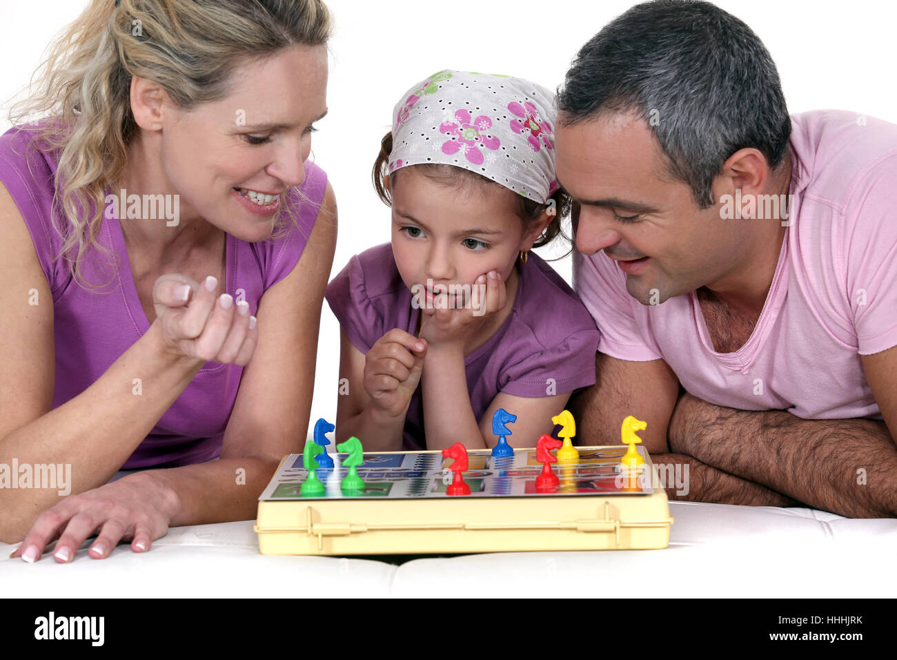 Family playing chess Stock Photo - Alamy