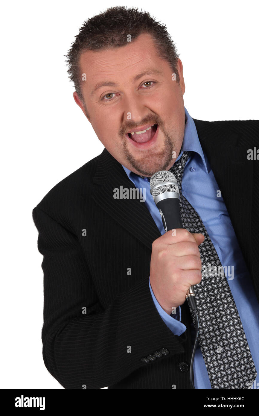 Chubby businessman singing karaoke Stock Photo - Alamy