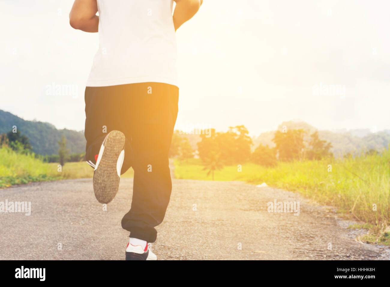 Man running back view one hi-res stock photography and images - Alamy