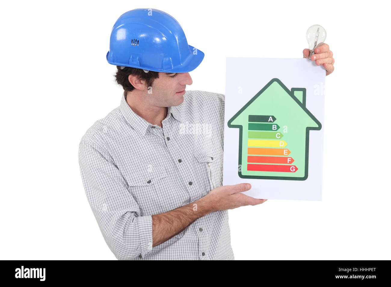 Engineer holding an energy efficiency rating sign Stock Photo - Alamy
