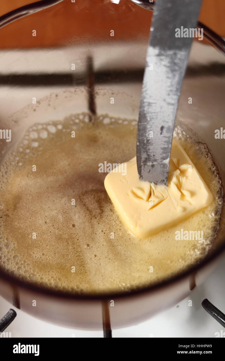 Melting butter in glass saucepan. Making Potato and Leek Filo Pie ...