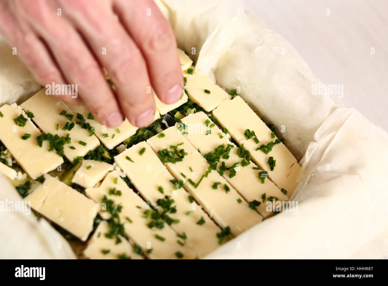 Sprinkle cheese layer with minced chives. Making Potato and Leek Filo ...