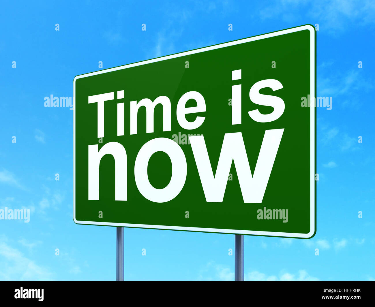 Time concept: Time is Now on road sign background Stock Photo - Alamy
