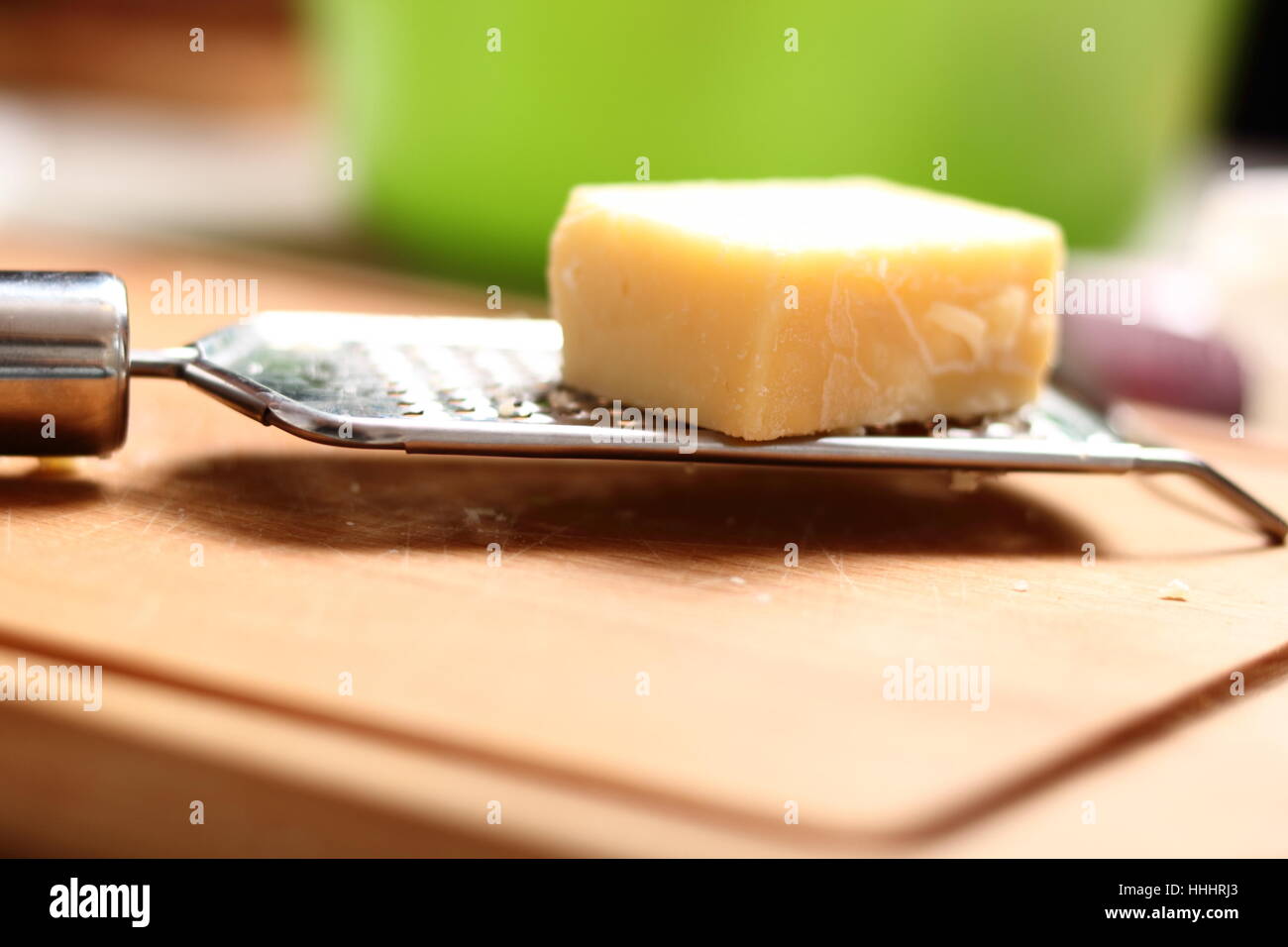Grating Cheddar Cheese Stock Photo - Alamy