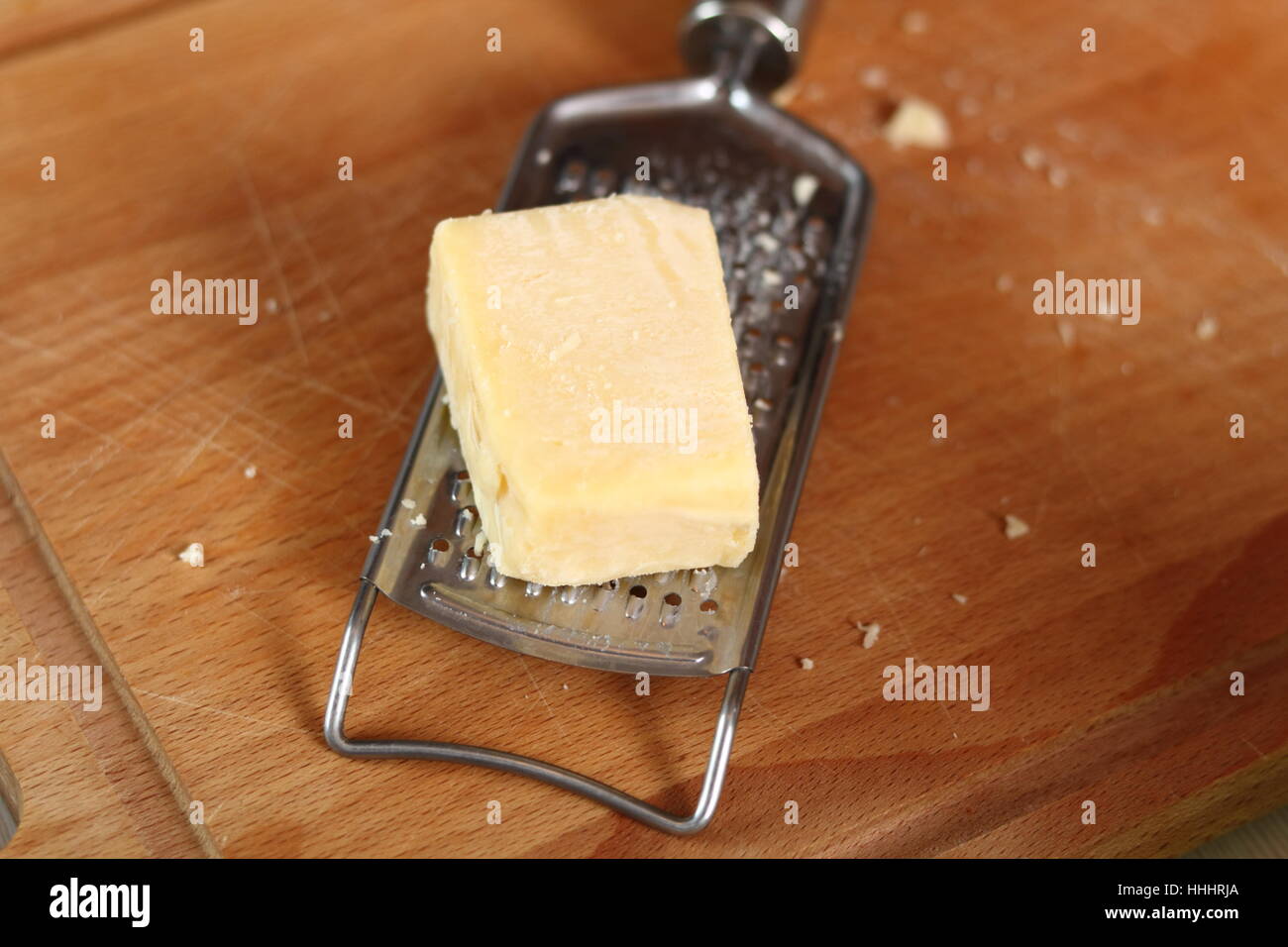 Grating Cheddar Cheese Stock Photo - Alamy