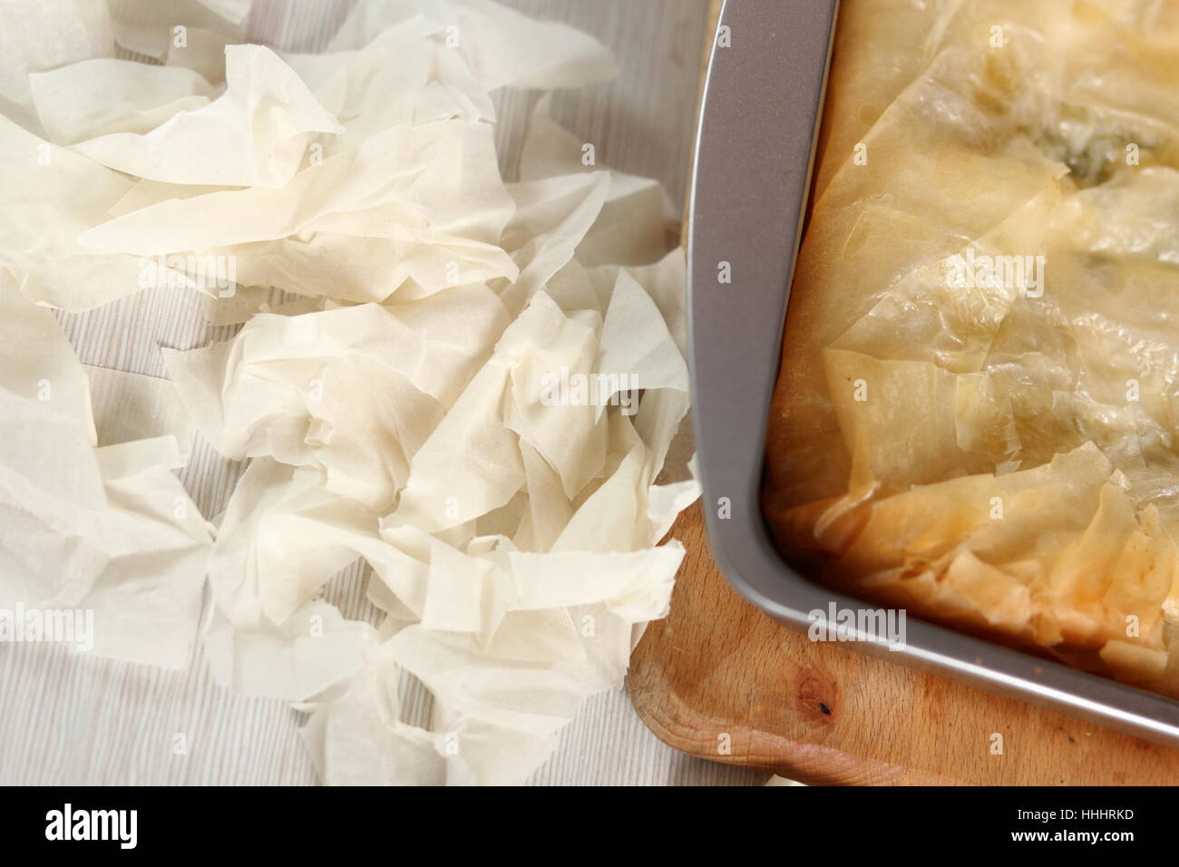 Flakes of filo pastry. Making Potato and Leek Filo Pie. Series Stock ...