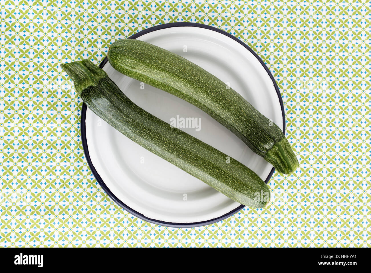 two whole courgettes Stock Photo - Alamy