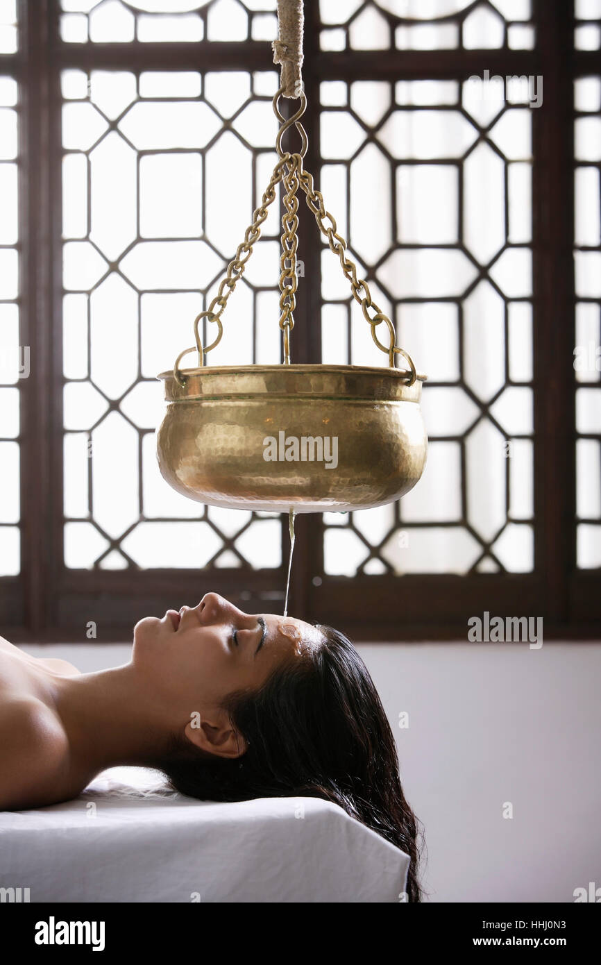 young woman having Ayurvedic spa treatment Stock Photo - Alamy
