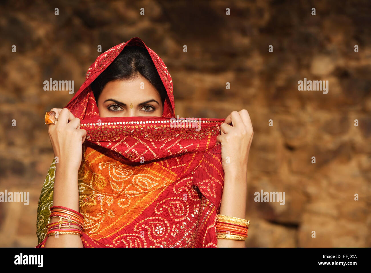 woman with sari covering face Stock Photo - Alamy