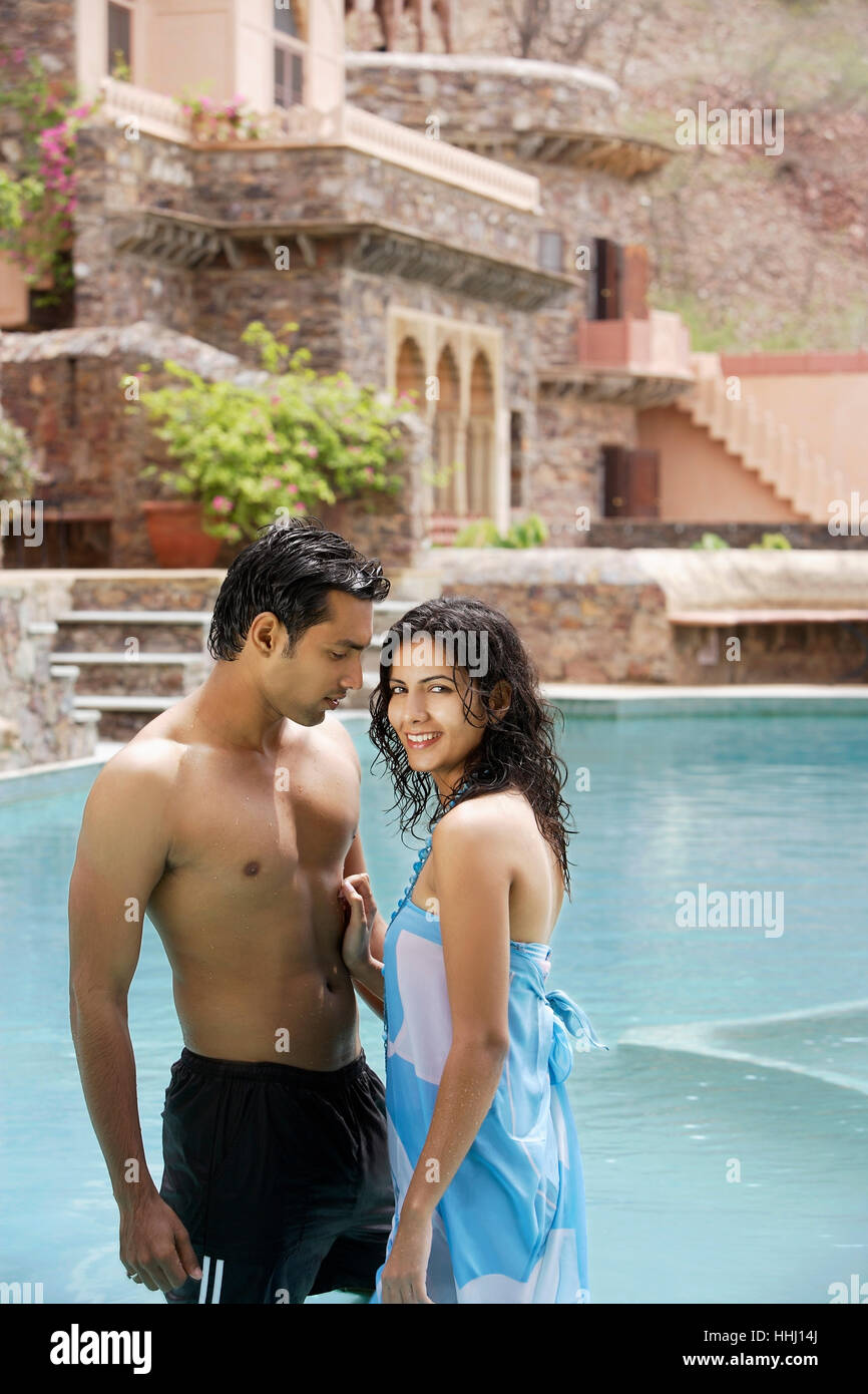young couple in pool Stock Photo - Alamy