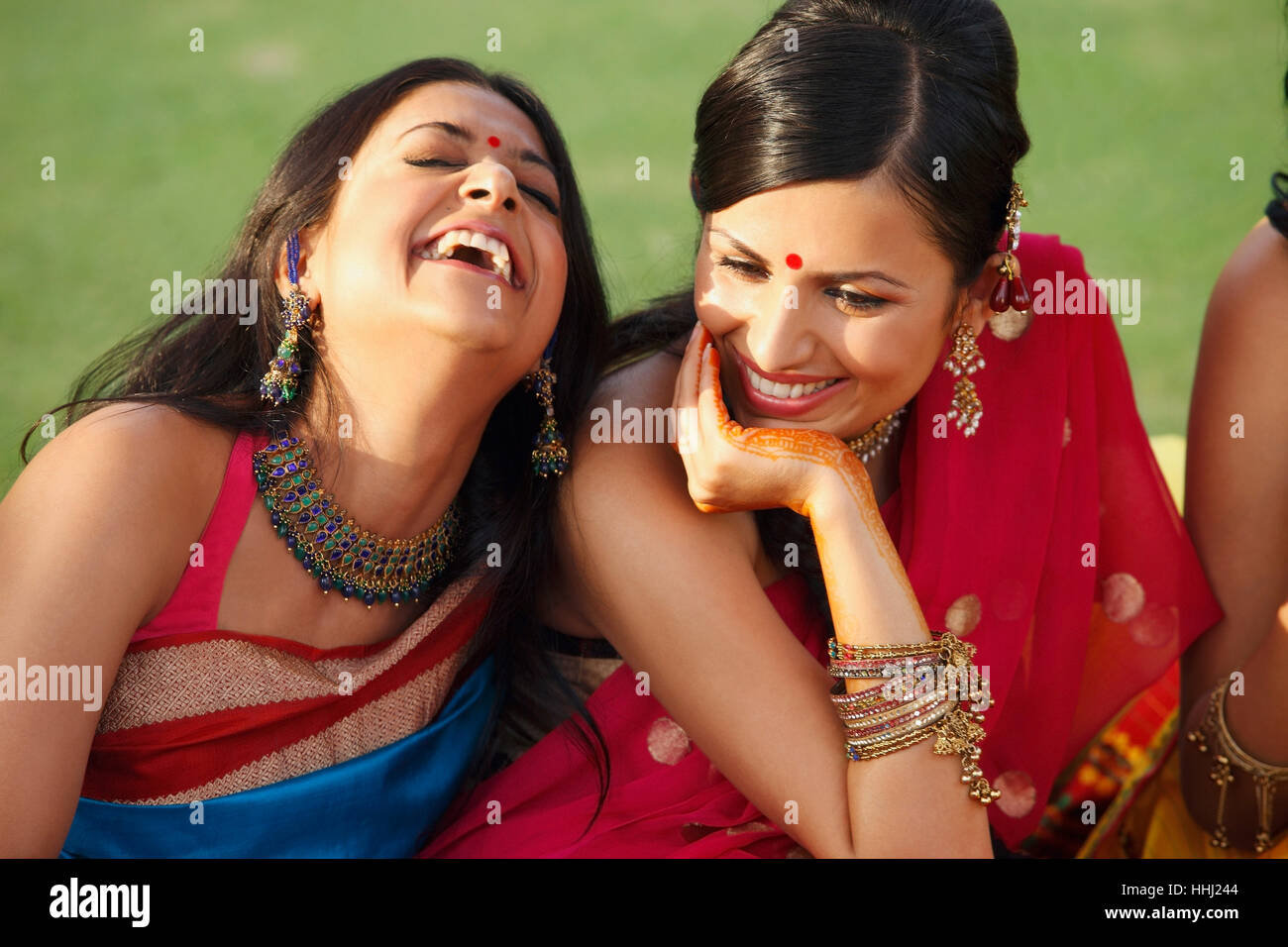 two women in saris, laughing Stock Photo - Alamy