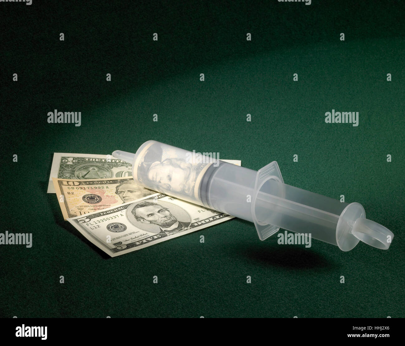 Cash stuffing hi-res stock photography and images - Alamy