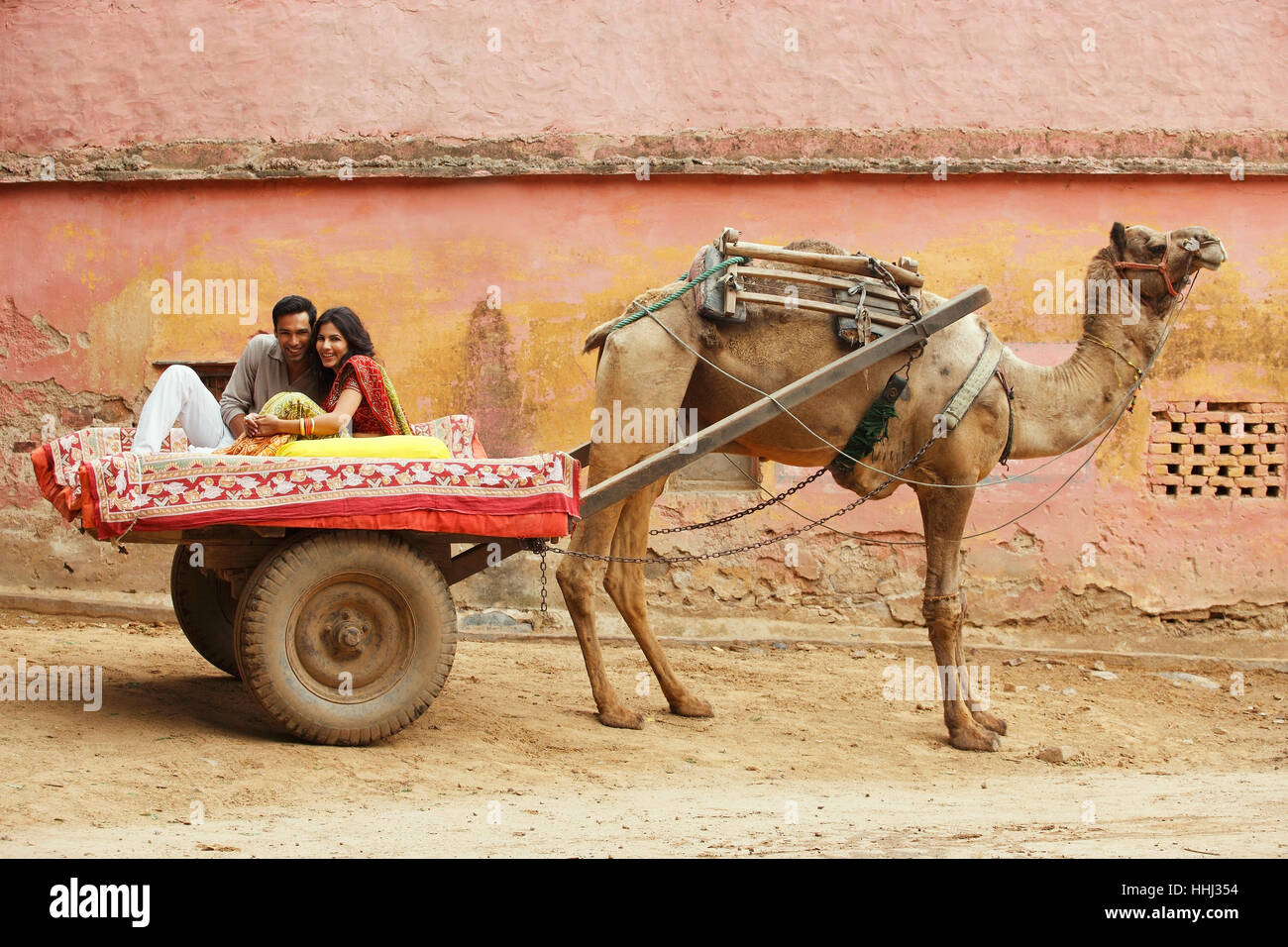 couple on camel cart Stock Photo - Alamy