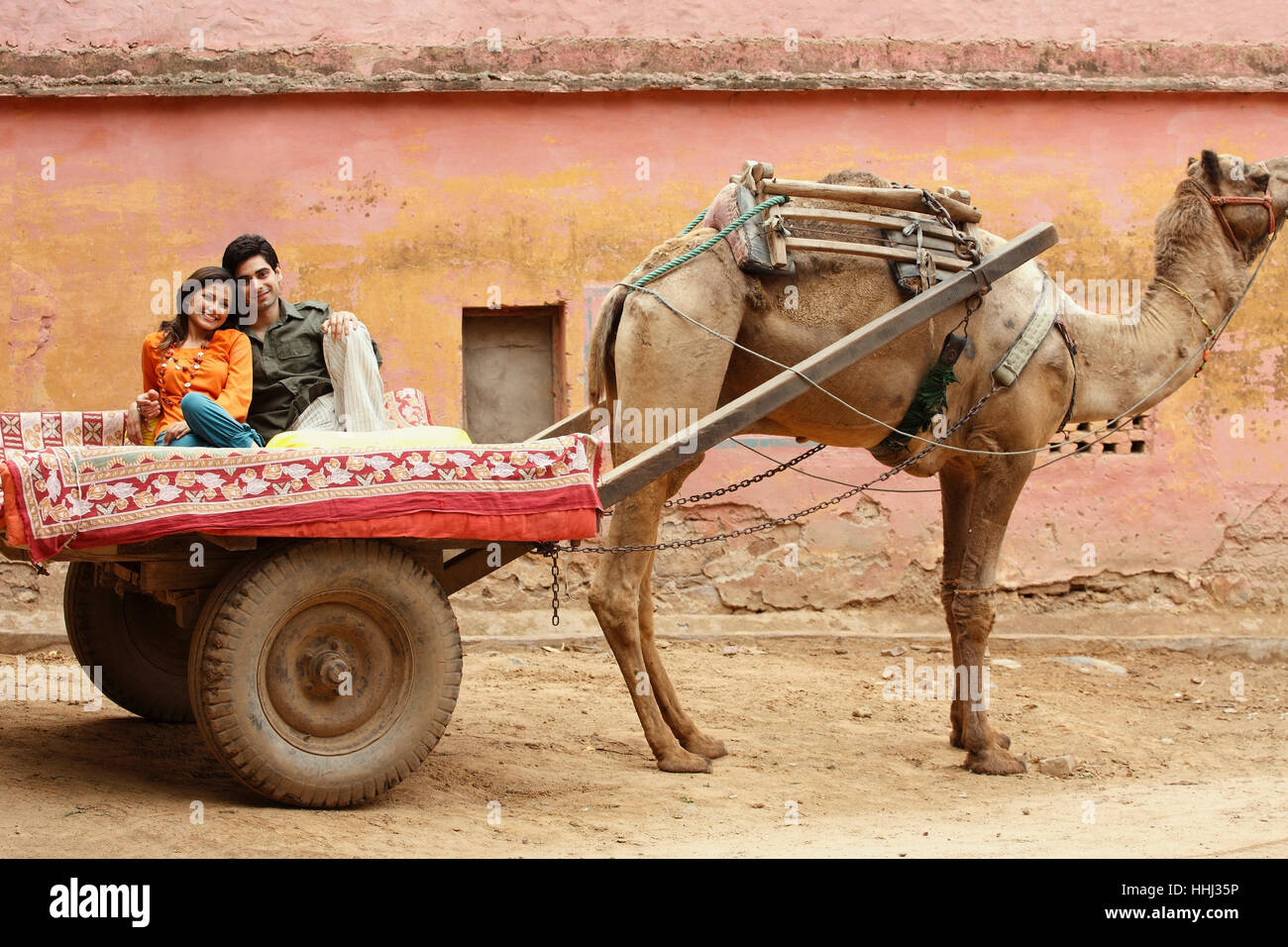 couple on camel cart Stock Photo - Alamy