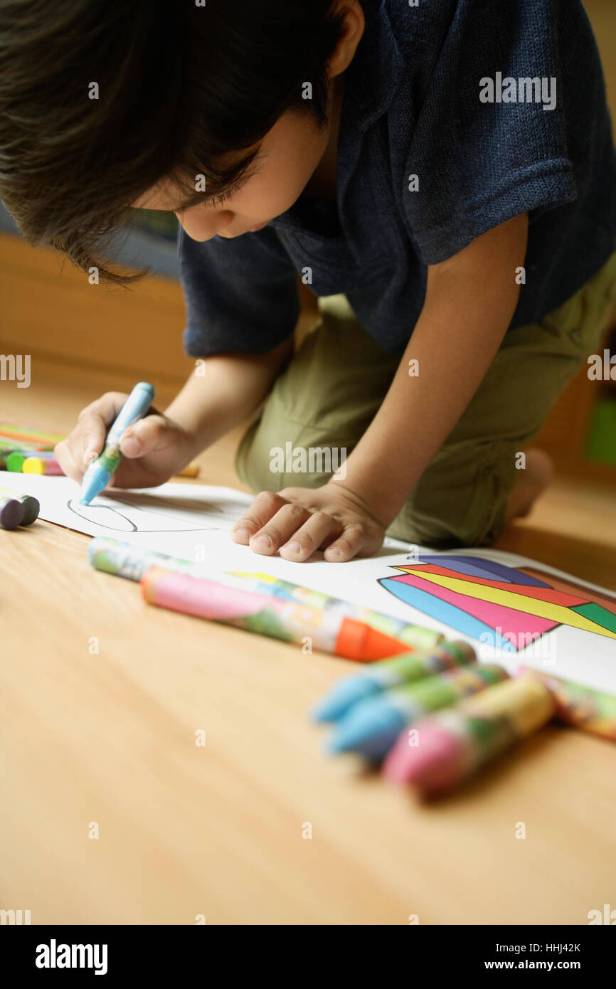 Little boy coloring Stock Photo - Alamy