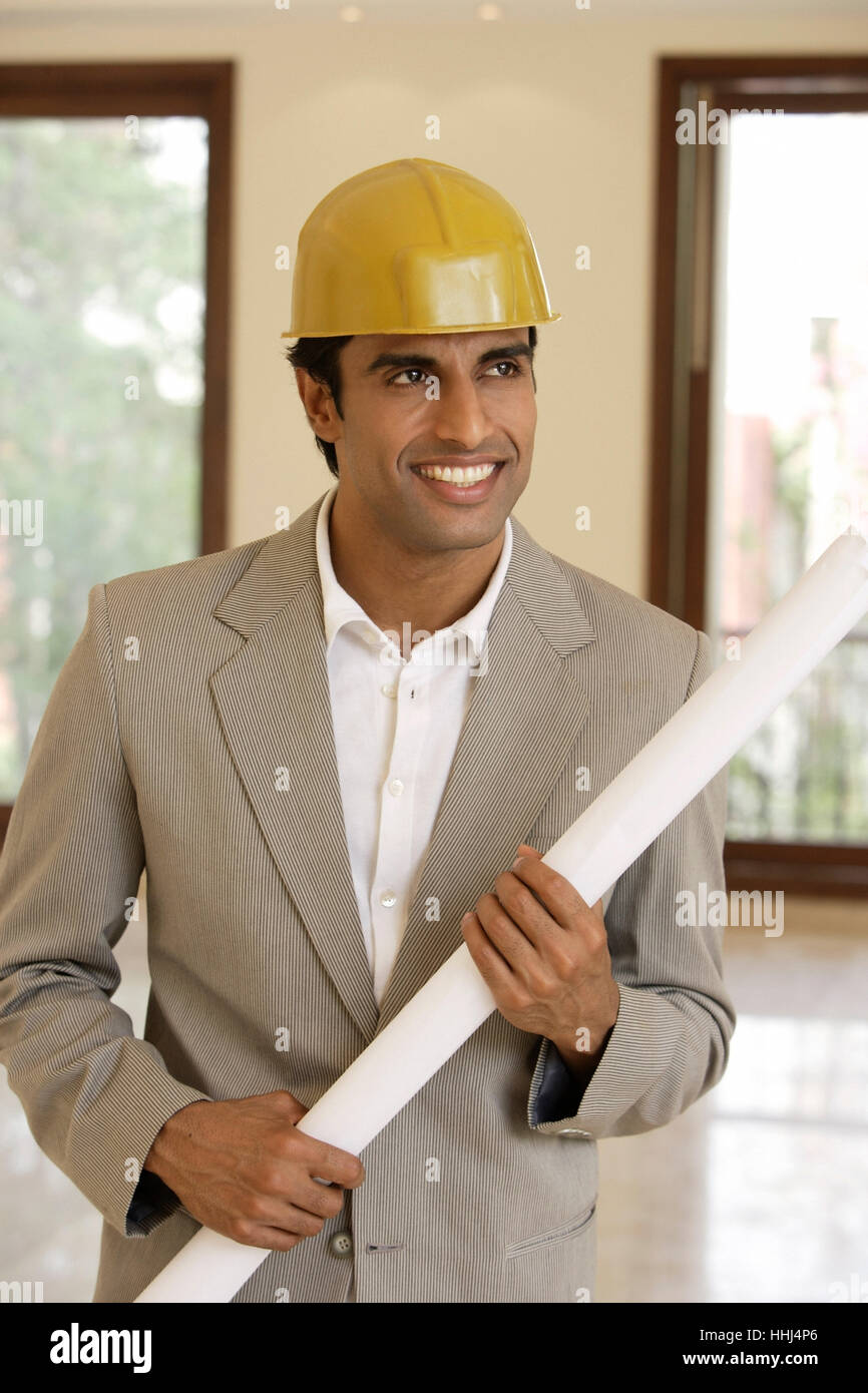 portrait of contractor with blueprints Stock Photo - Alamy