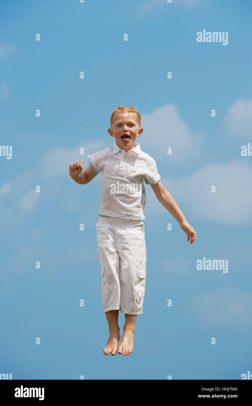 boy jumping in mid-air Stock Photo - Alamy