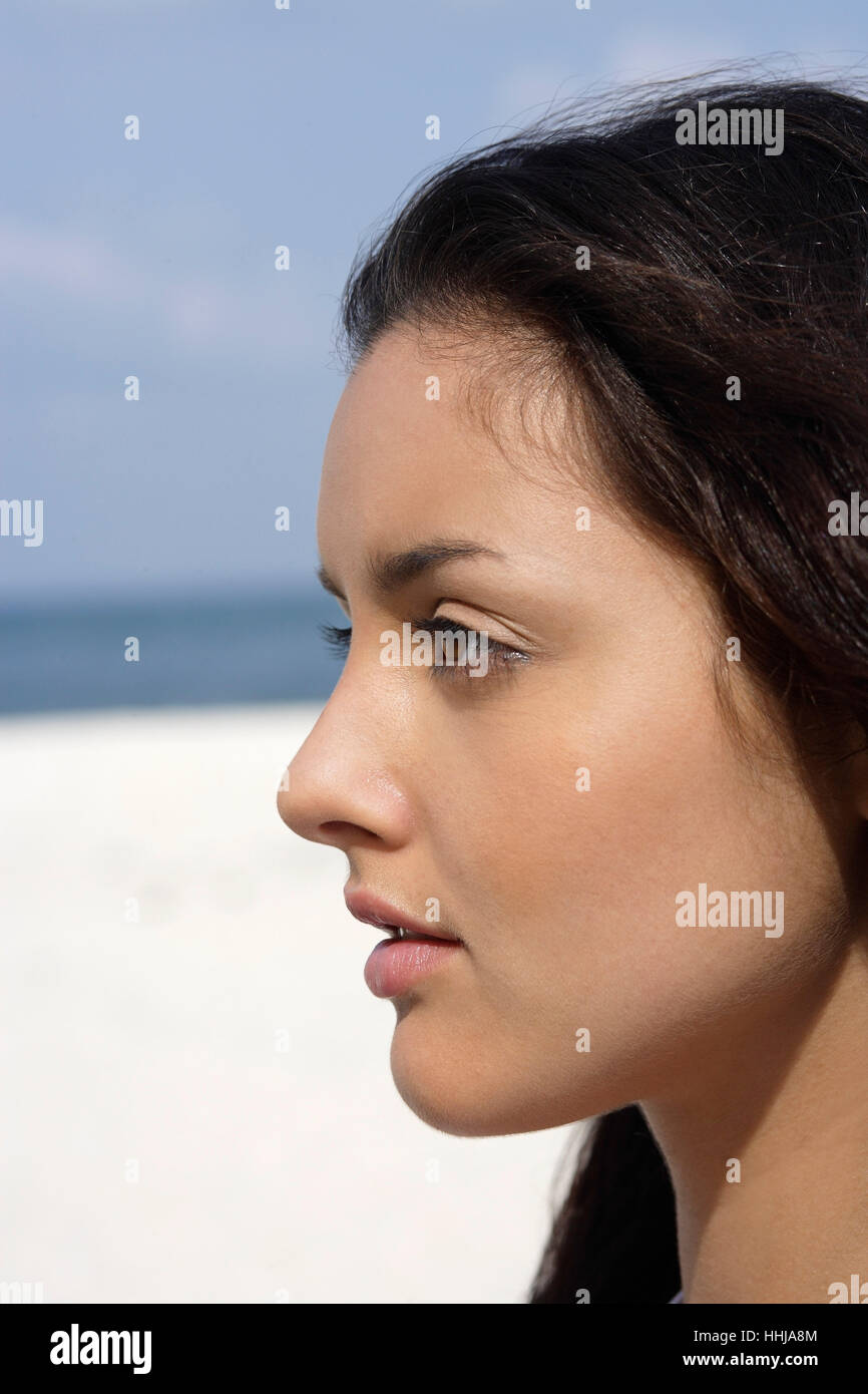 profile of young woman on beach Stock Photo - Alamy