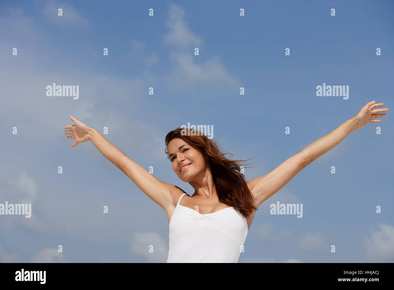woman with arms open wide Stock Photo - Alamy