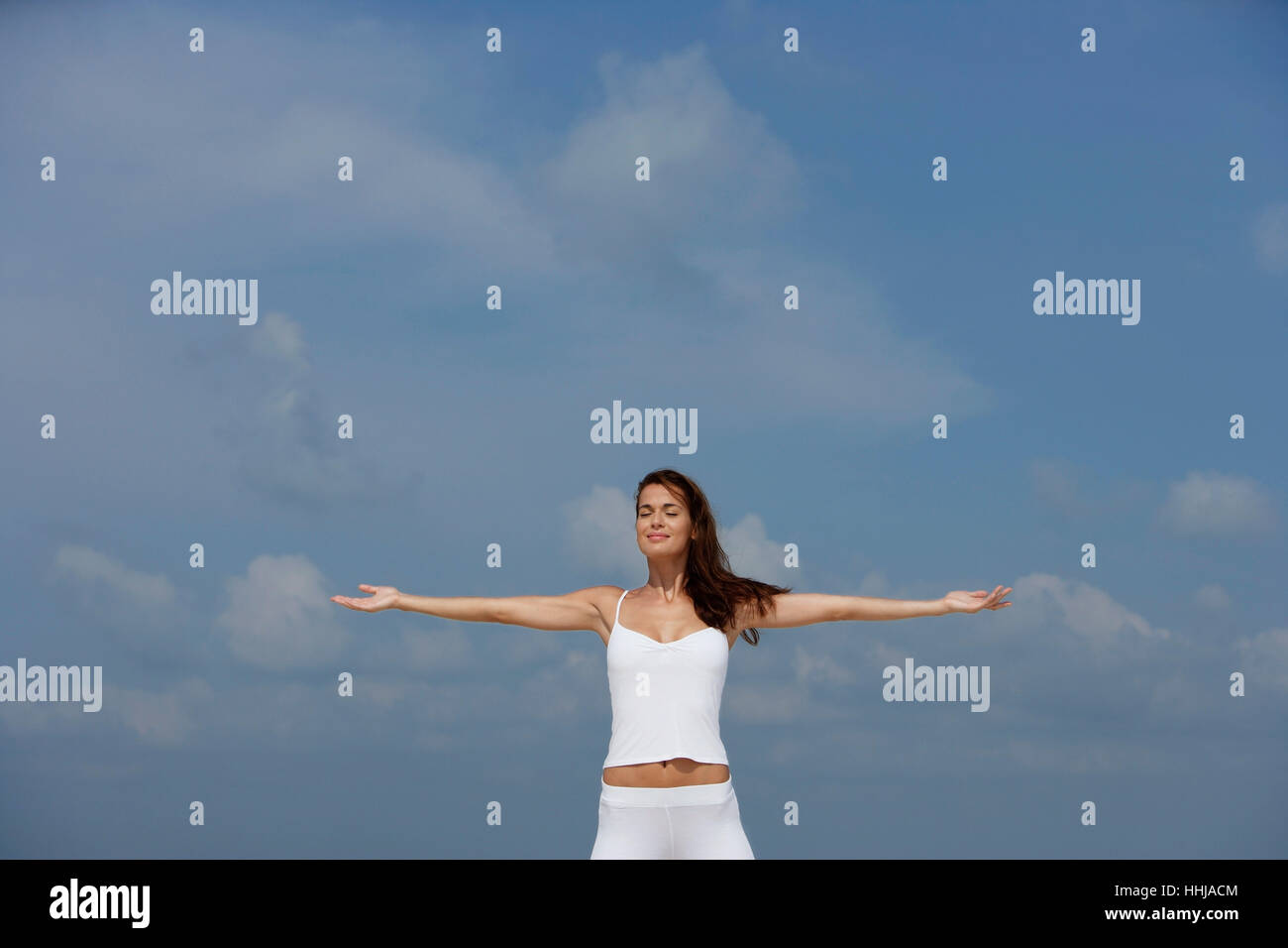 woman with arms open wide Stock Photo - Alamy